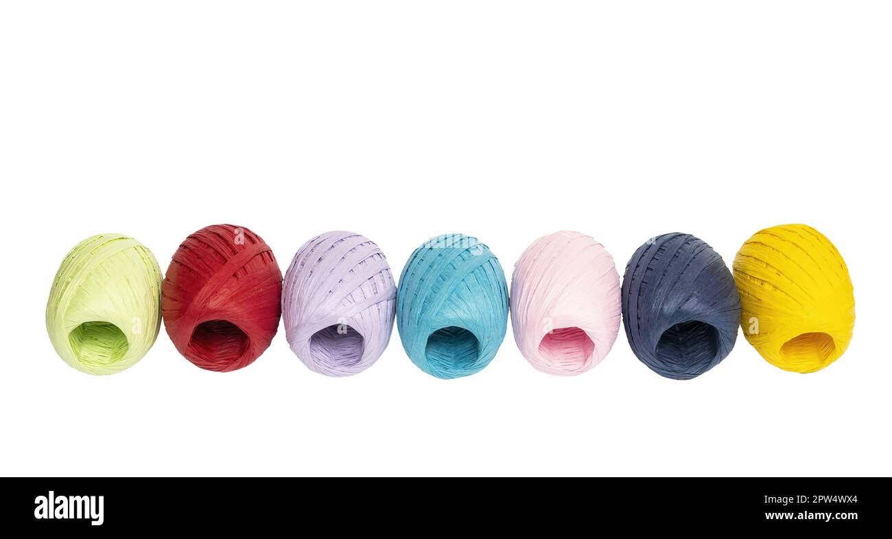 some balls of colored raffia on a transparent surface Stock Photo - Alamy