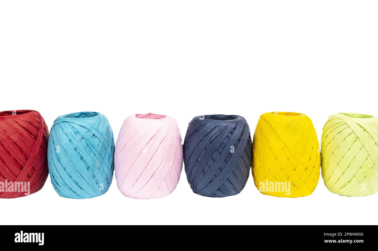 some balls of colored raffia on a transparent surface Stock Photo - Alamy