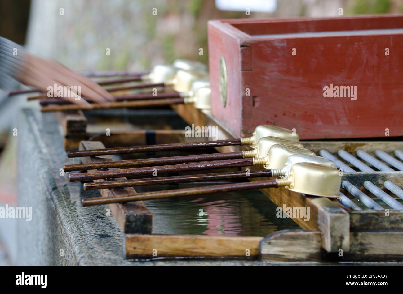 Dippers prepared for the ceremonial purification rite known as temizu ...