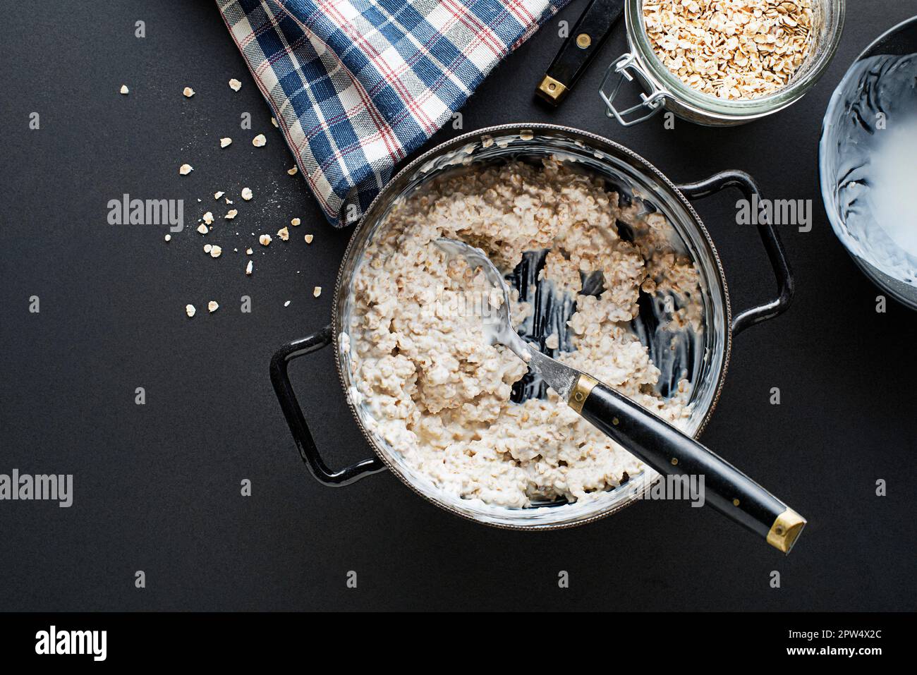 Oatmeal plate. Cooked oatmeal served with fresh yogurt. Healthy food ...
