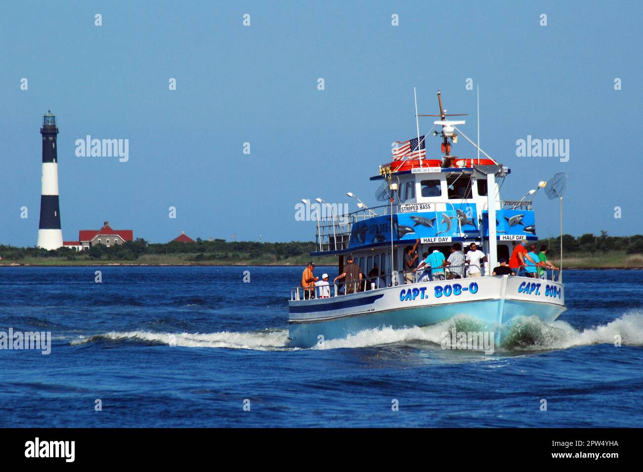 the charter fishing boat Capt Bob O cruises through the Great South Bay ...