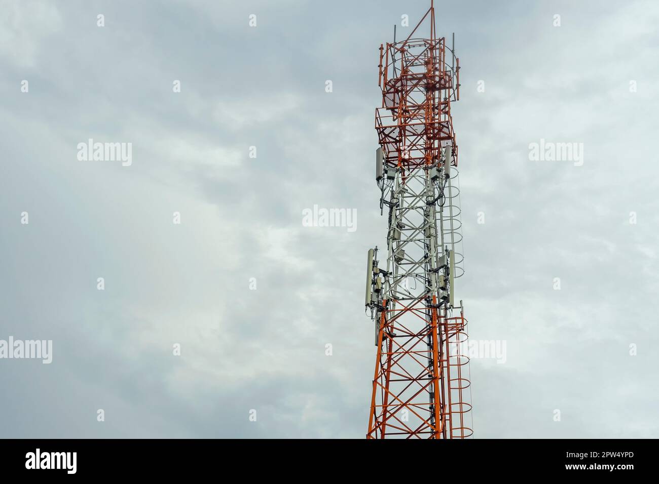 Communication tower transmission signal with blue sky Stock Photo - Alamy