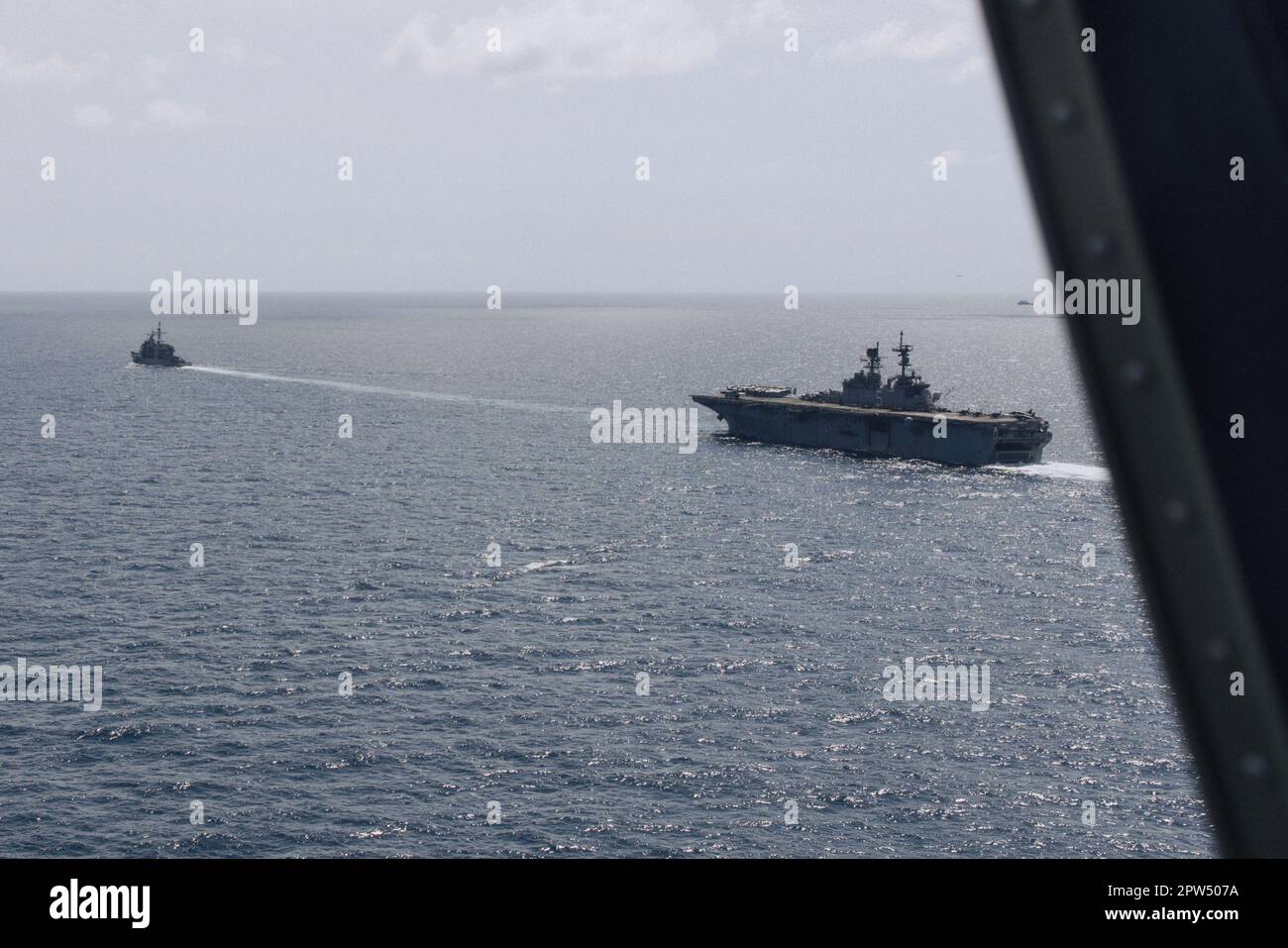 The Ticonderoga-class cruiser USS San Jacinto (CG 56), left, and the ...