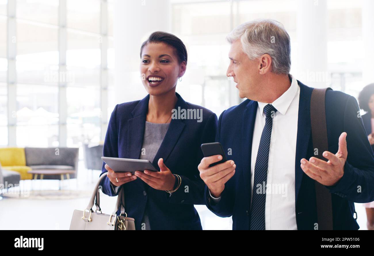 Male boss talking to female employee hi-res stock photography and ...