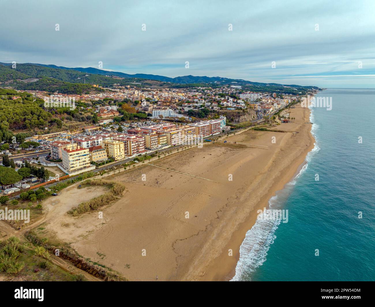 Aerial panoramic view of Canet de Mar city at dawn. Located in El ...