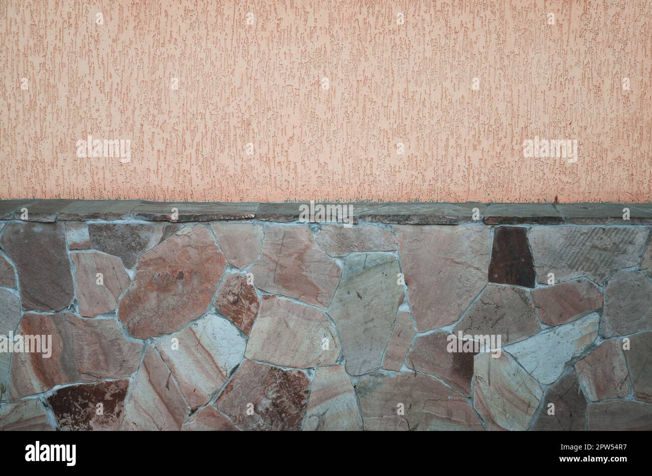 Concrete wall texture with colored plaster. Beautiful design facade ...