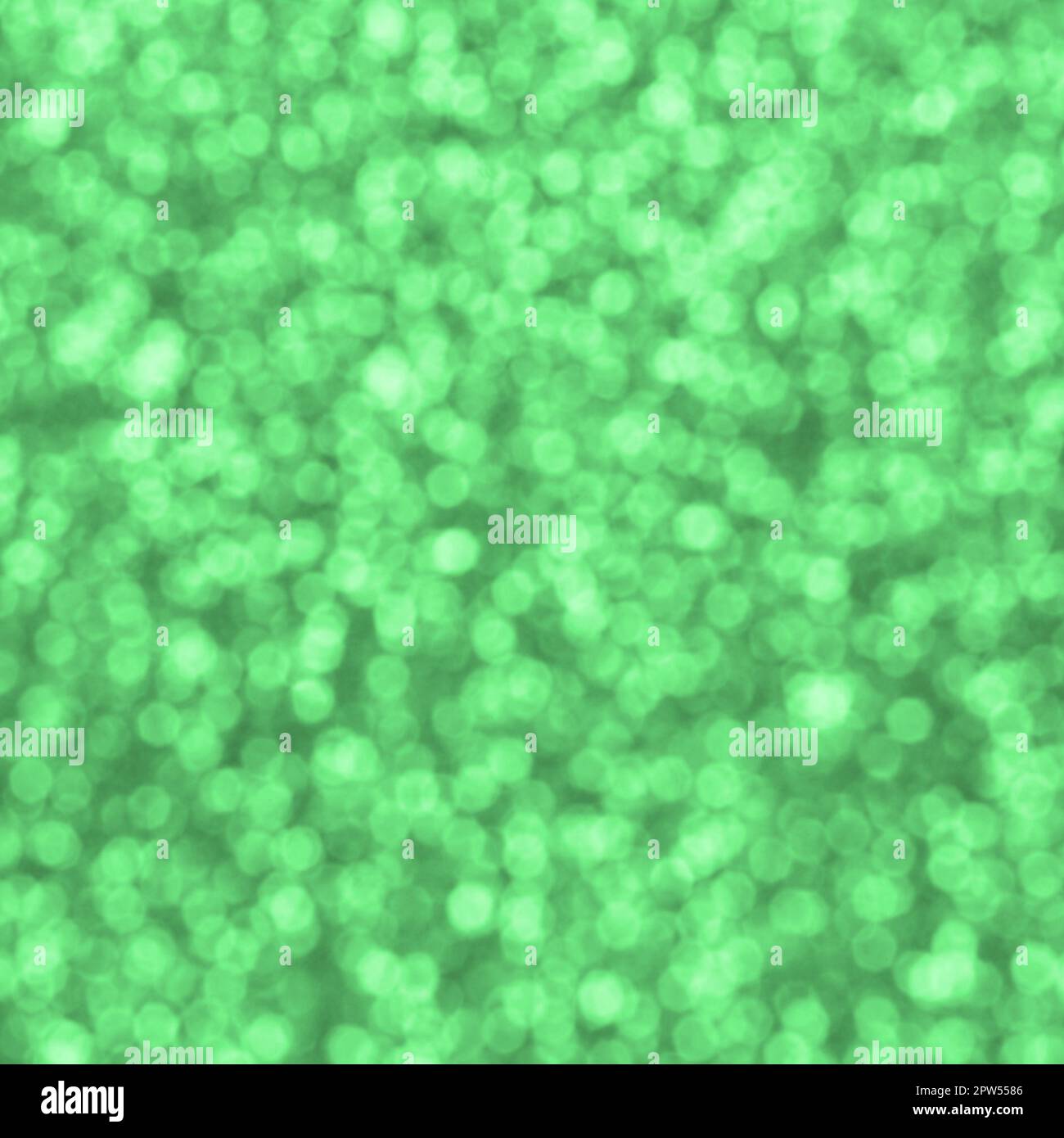 Blurred green decorative sequins. Background image with shiny bokeh ...