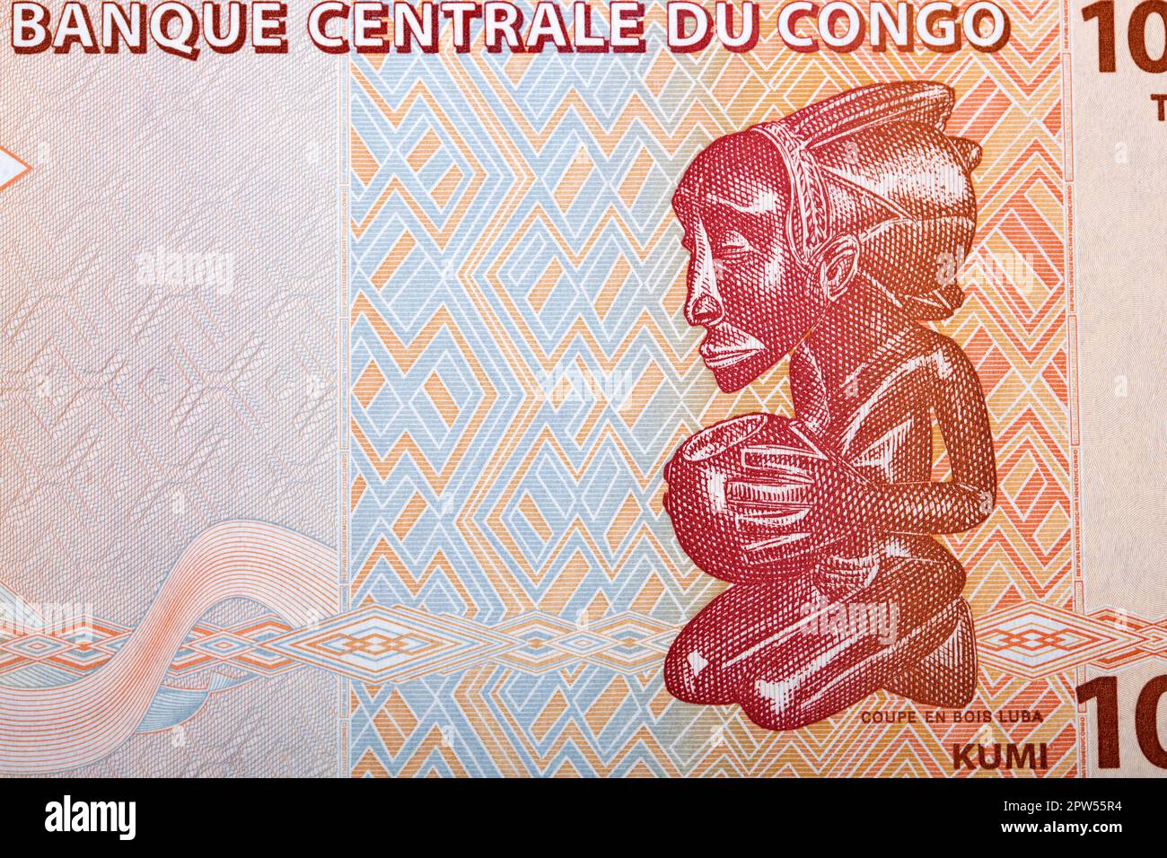 Luba carving from Congolese money - franc Stock Photo - Alamy