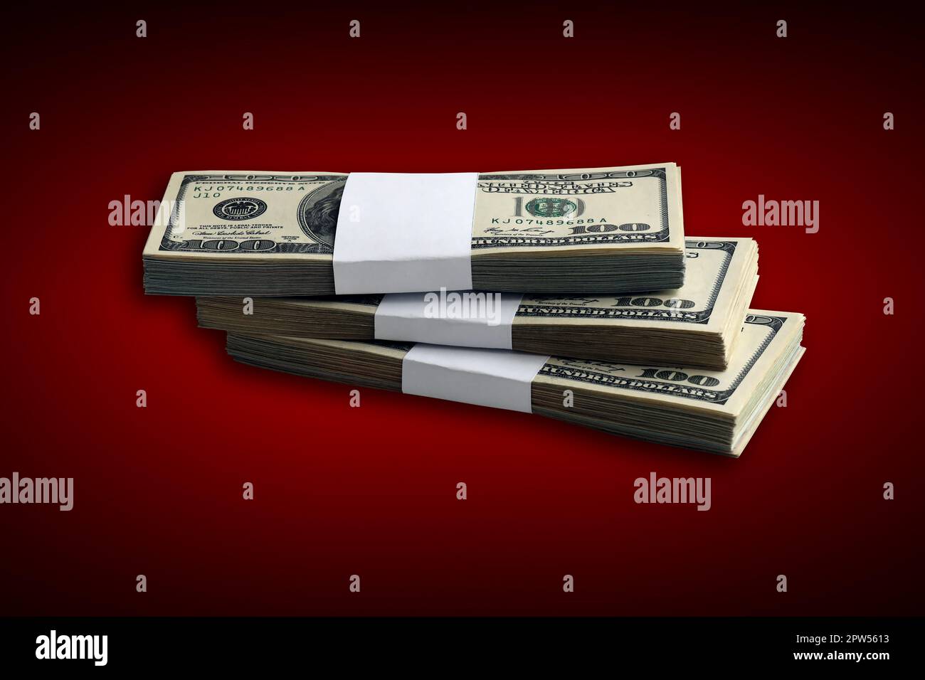Bundle of US dollar bills on crimson red background. Pack of american ...