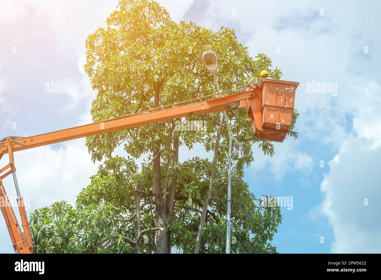 Use crane to lift the light bulbs to repair the light pole Stock Photo ...