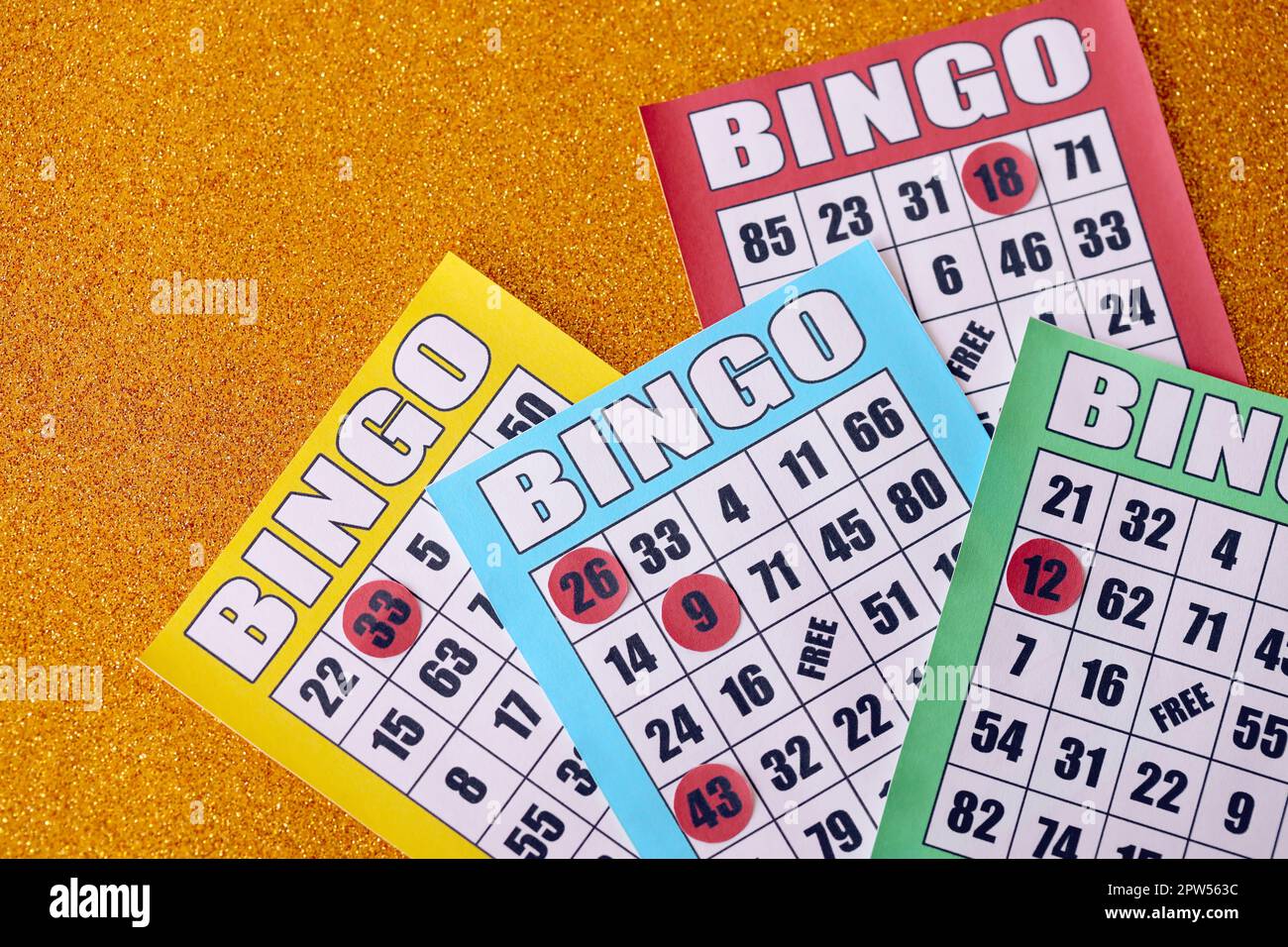 Many colorful bingo boards or playing cards for winning chips. Classic ...