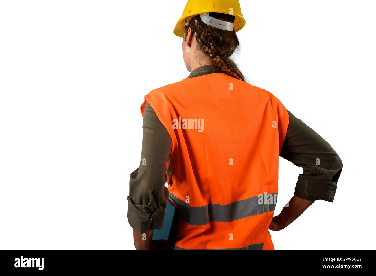 woman with helmet and jacket who work in a warehouse Stock Photo - Alamy