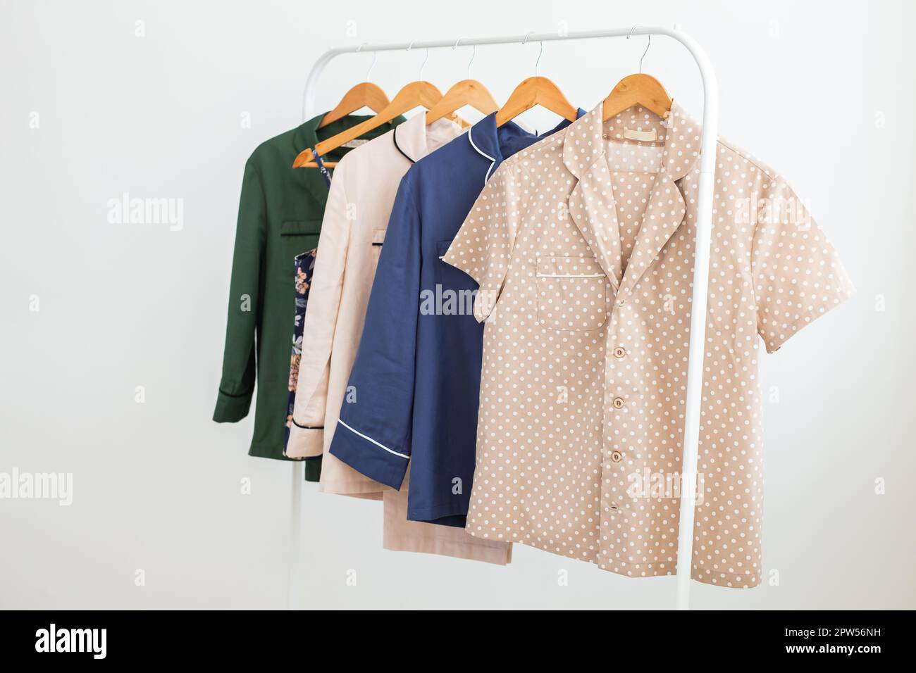 Clothing retails concept. Ladies pajamas on hangers in clothes store ...