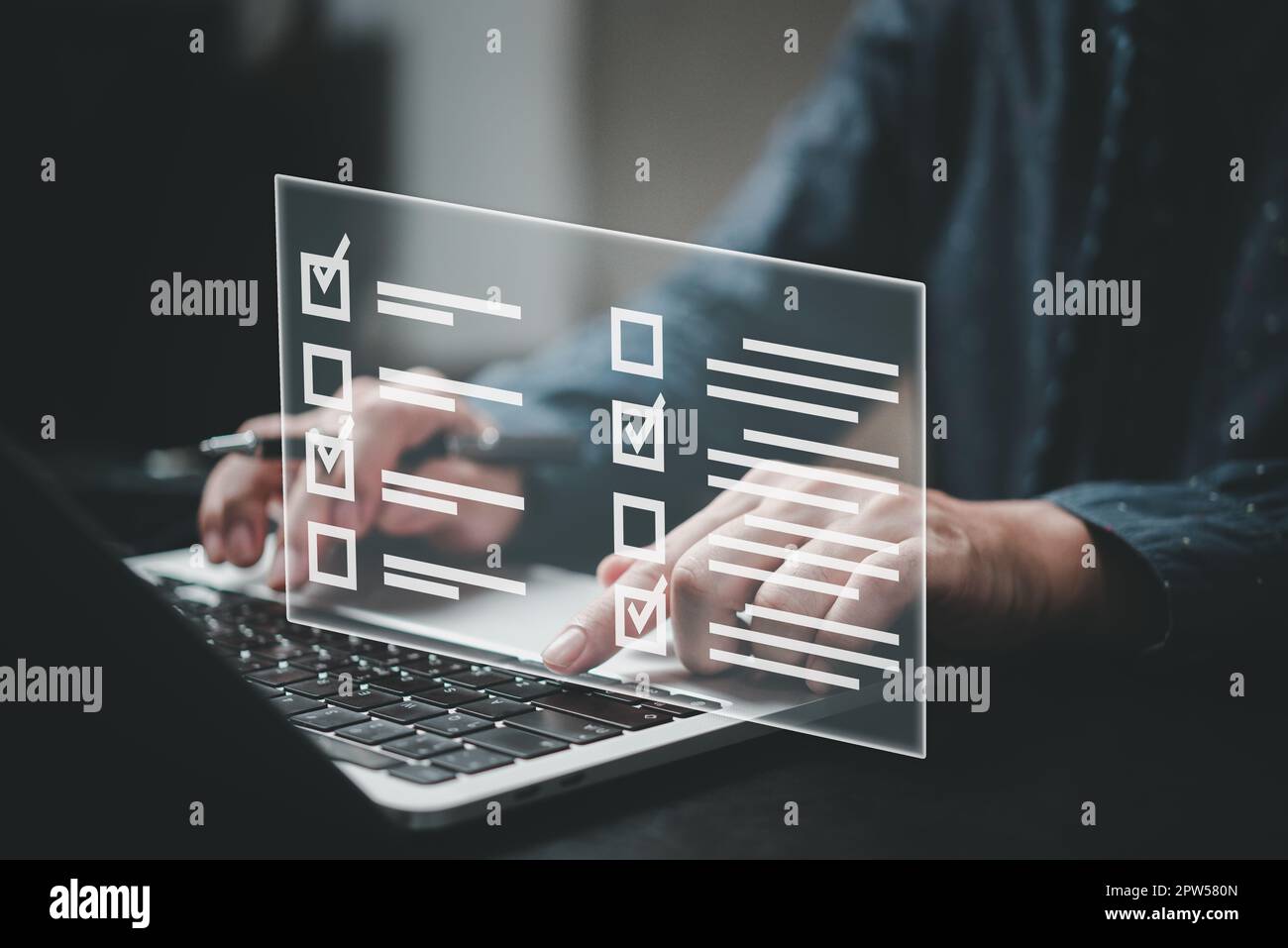 man using laptop questionnaire with checkbox, survey form online ...