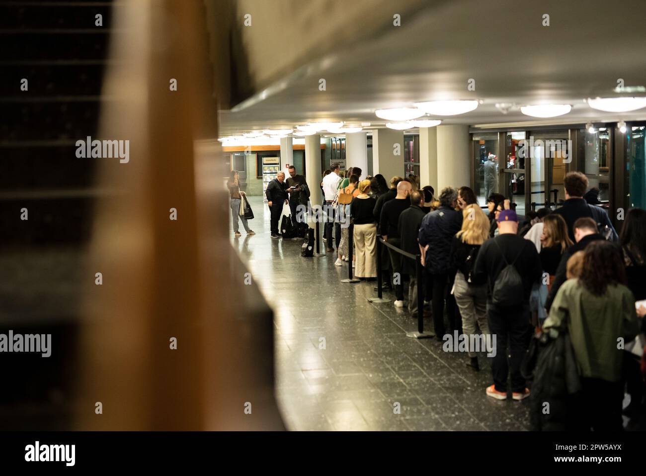 Berlin, Germany. 28th Apr, 2023. People wait in line at a book signing ...