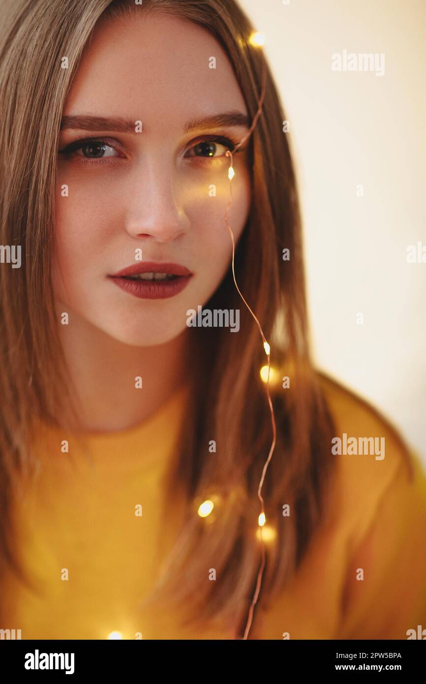 Profile portrait of young beautiful brunette woman with closed eyes and ...
