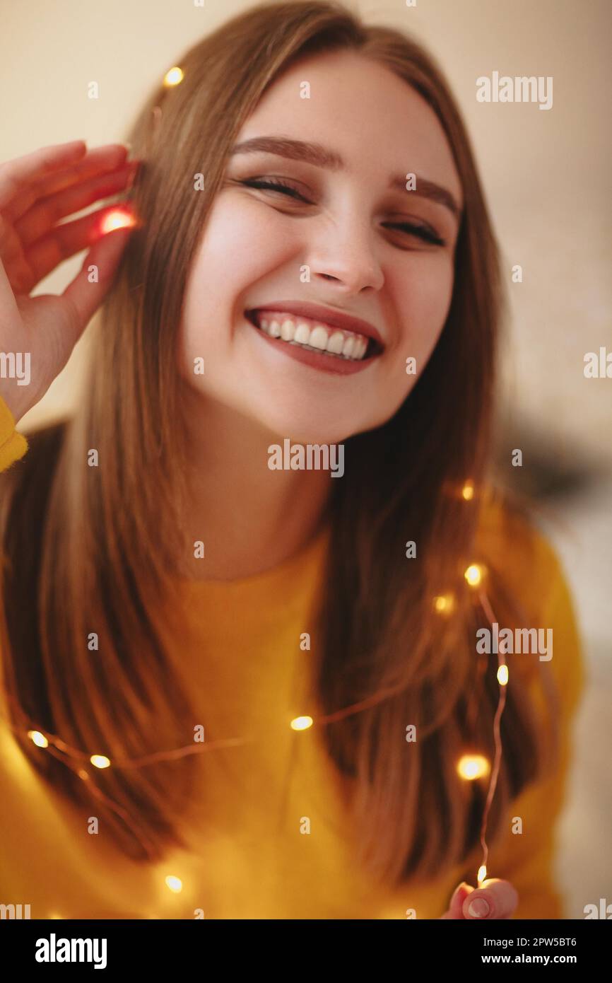 Profile portrait of young beautiful brunette woman with closed eyes and ...