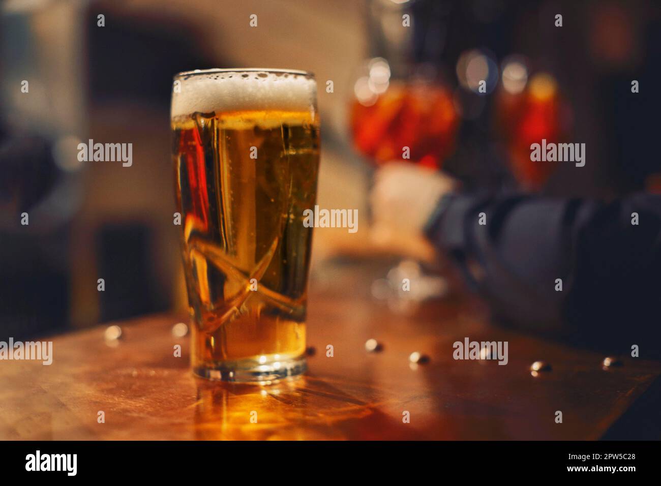 Pint of beer at the bar in a traditional pub. close up Stock Photo - Alamy