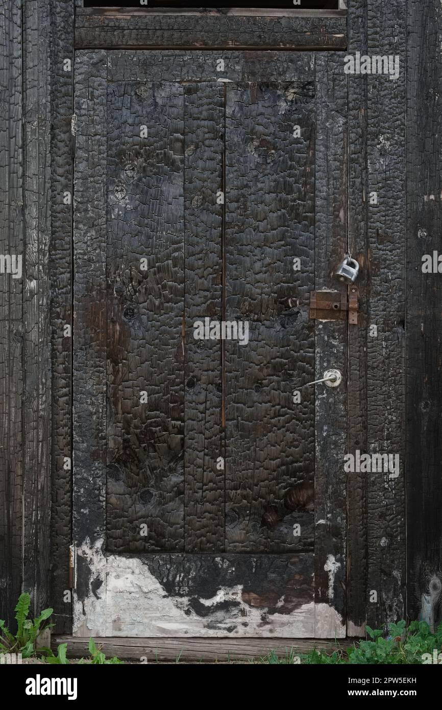 Burned wooden door hi-res stock photography and images - Alamy