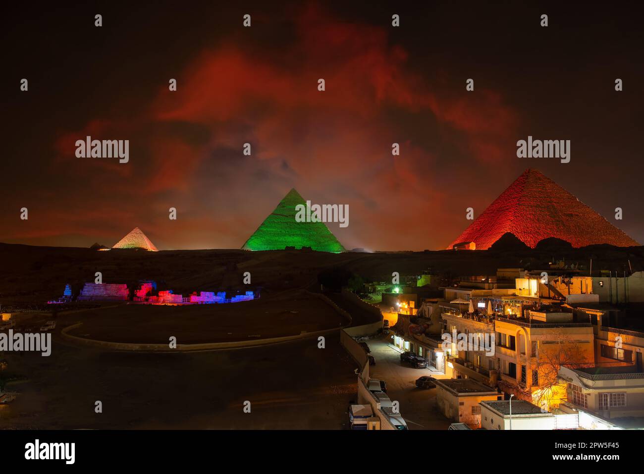 The Pyramids and the Sphinx in the night lights, Giza, Egypt Stock ...