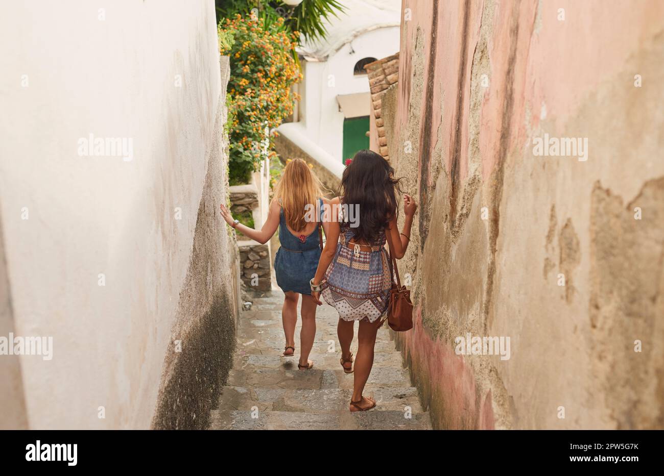 Friends, summer and travel on city alley steps in Brazil for holiday ...