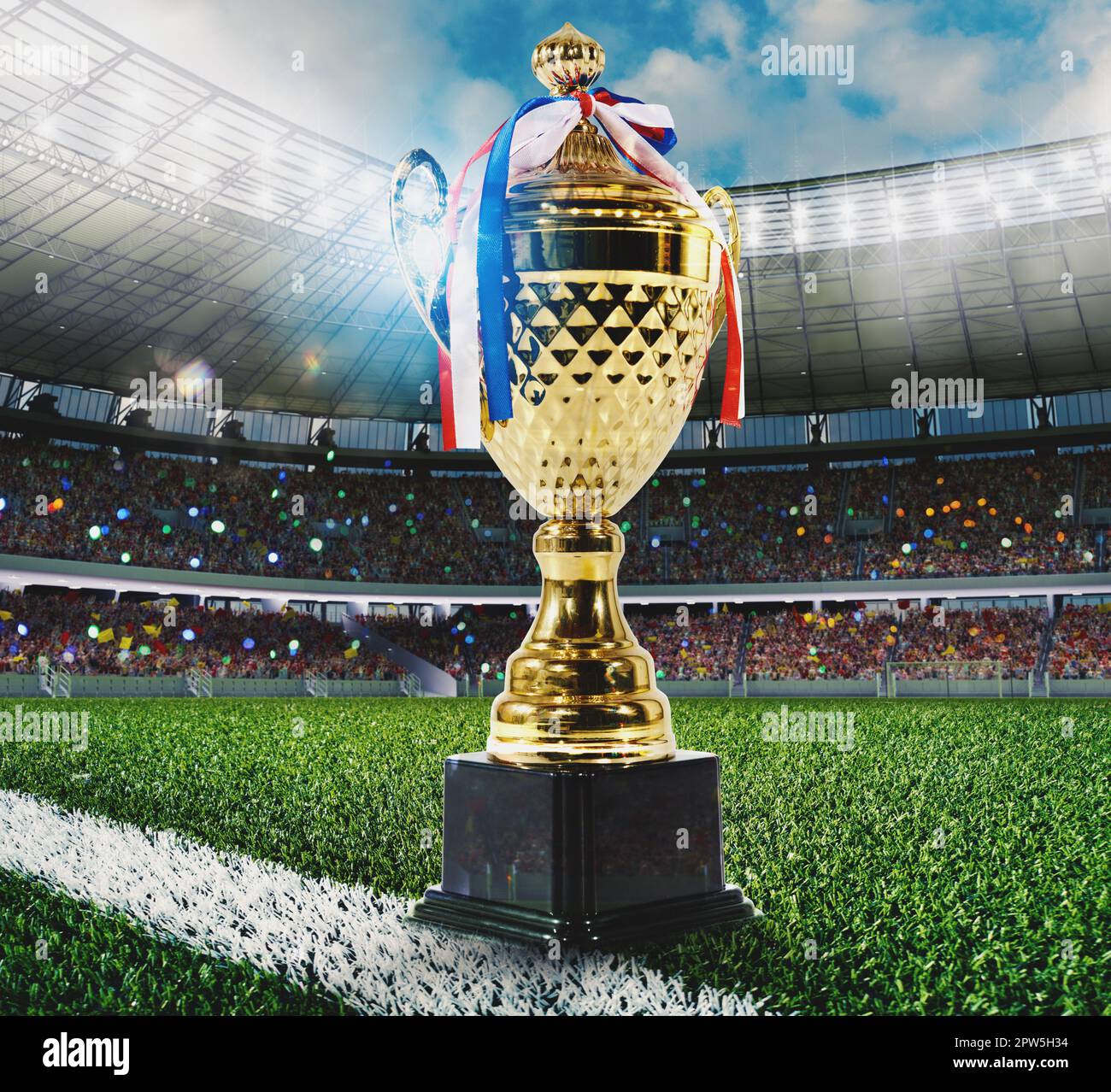 Golden soccer cup in a football stadium Stock Photo - Alamy