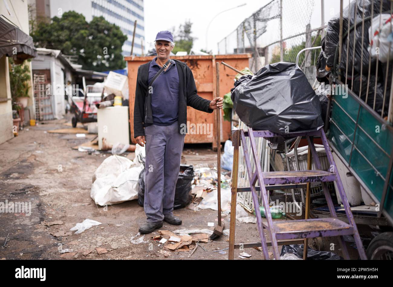 Homeless man looking garbage dumpster hi-res stock photography and ...