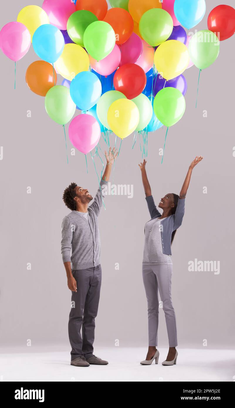 Releasing balloons indoors hi-res stock photography and images - Alamy