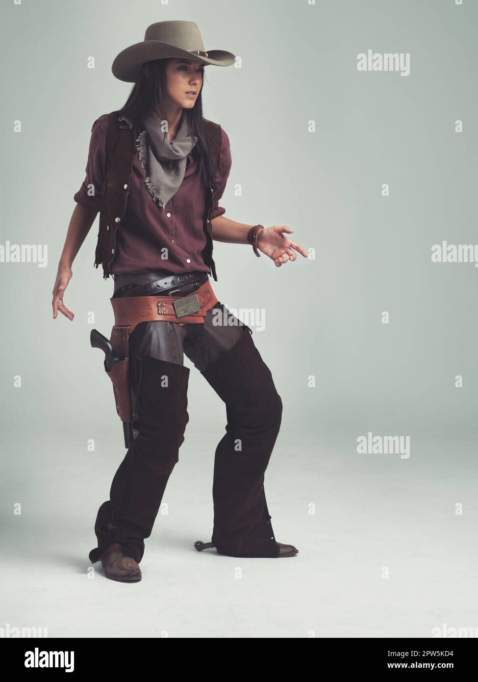 Im the sheriff around these parts...Full-length shot of an attractive ...