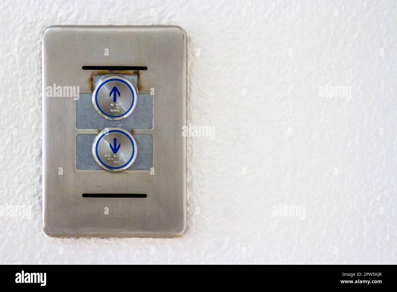 Press the elevator up and keypad elevator Stock Photo - Alamy