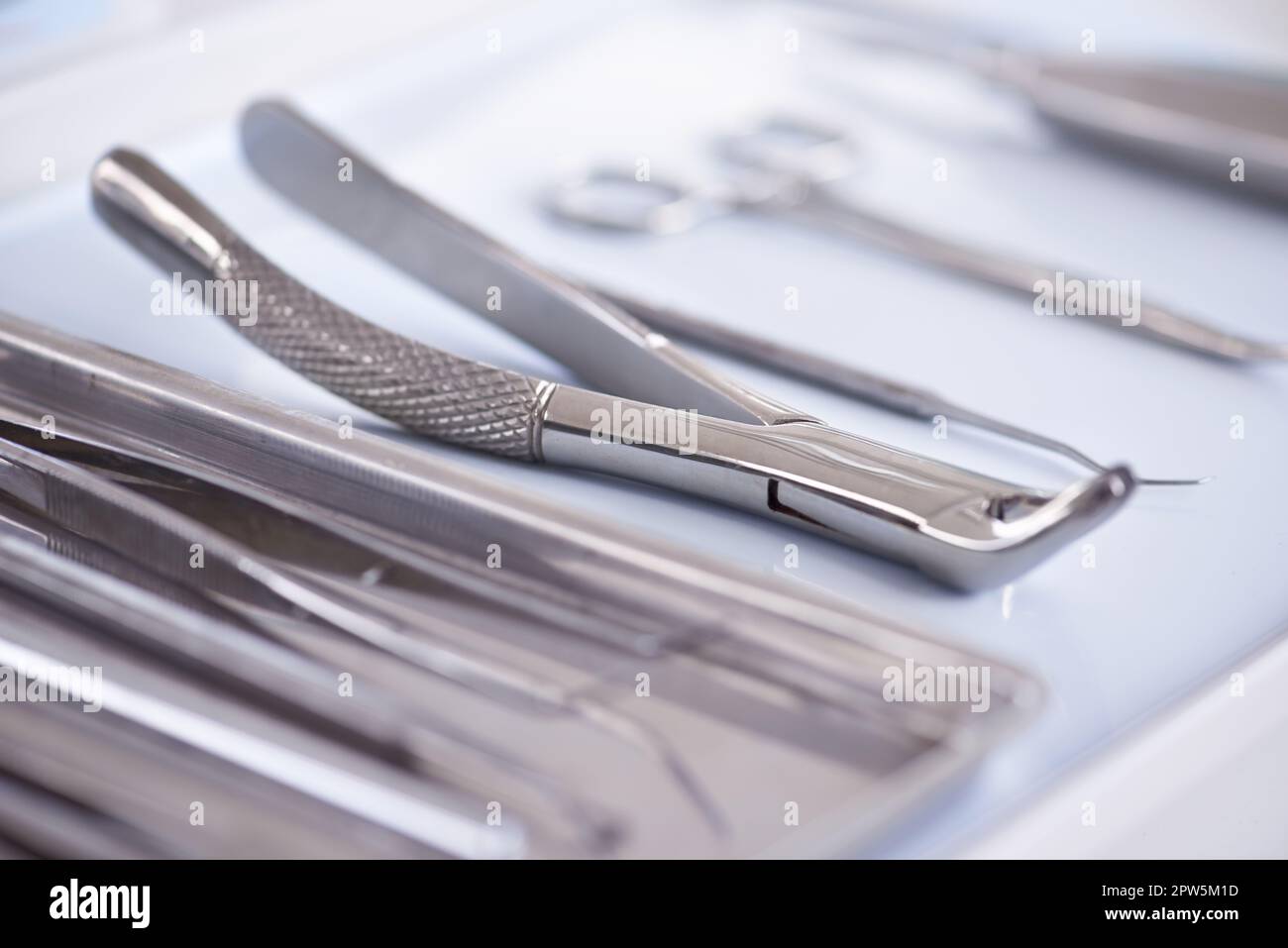 The tools of the trade. Closeup view of dental surgical instruments ...