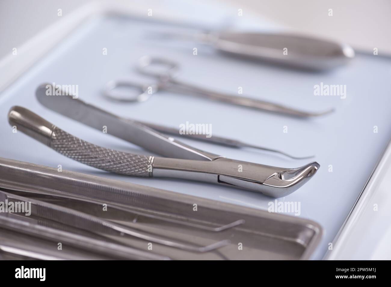 The tools of the trade. Closeup view of dental surgical instruments ...