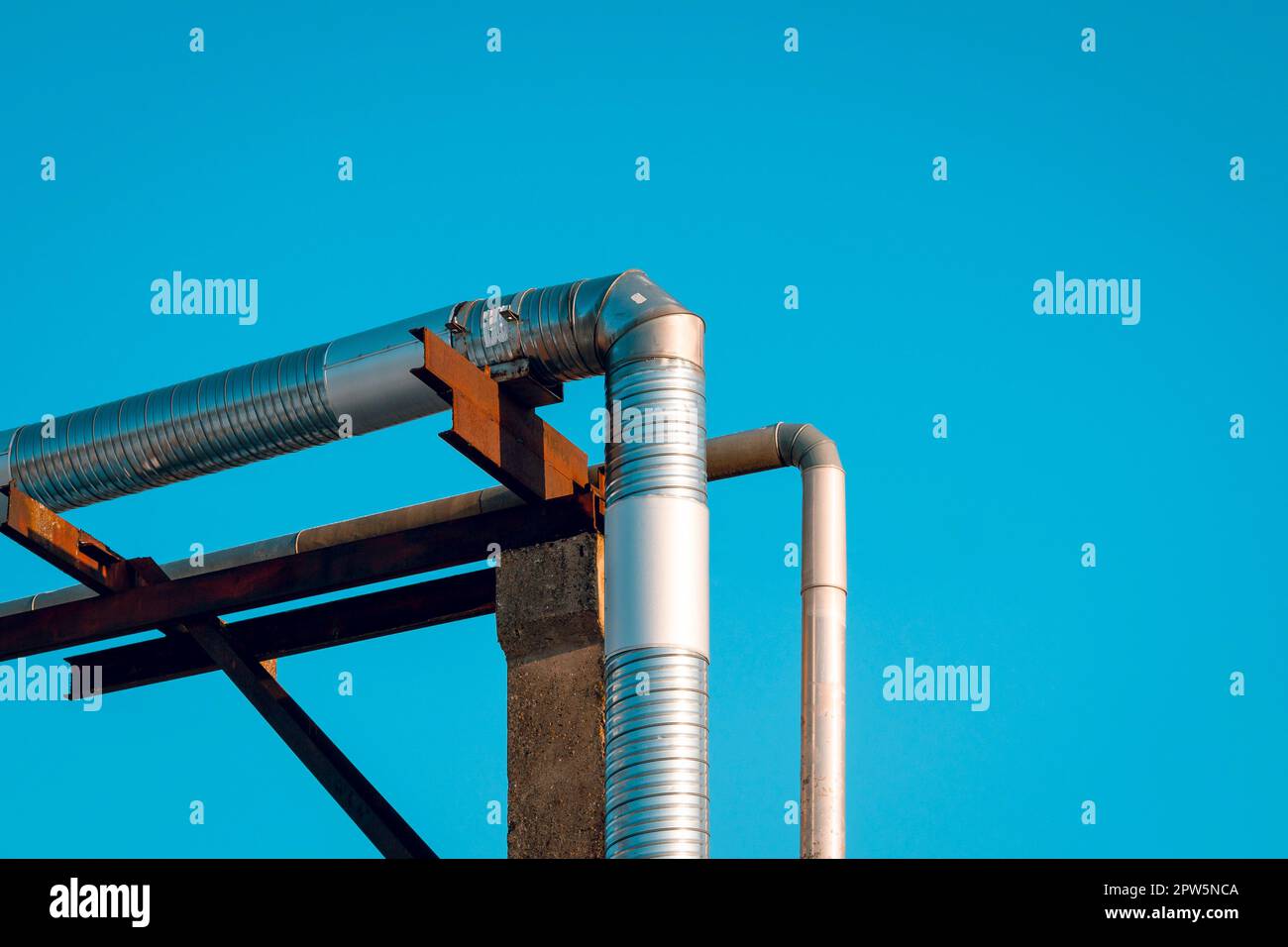 Bottom shot of a pipeline on sky background. Pipeline transportation is ...