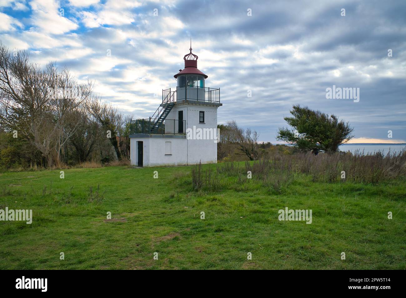 Lighthouse, Spodsbjerg Fyr in Huntsted on the coast of Denmark. Sun ...
