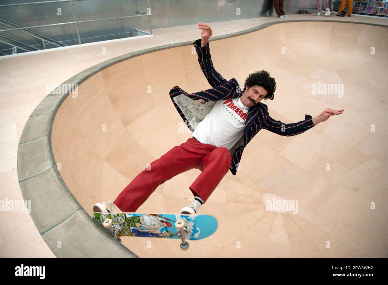 People skateboarding at a custom bowl built inside the Supreme brand ...