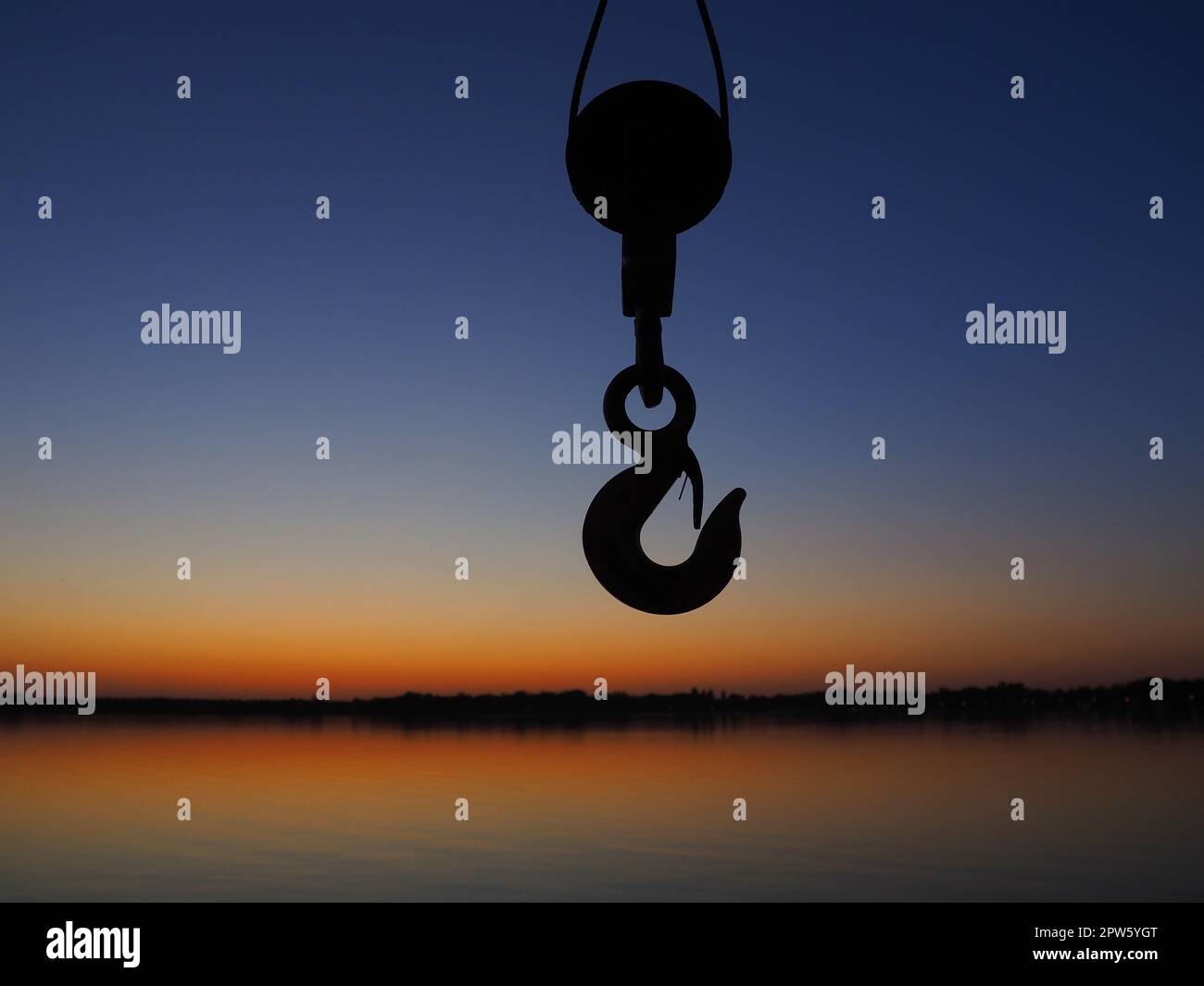 Harbor hook or bracket for transporting goods in a port or pier. The ...