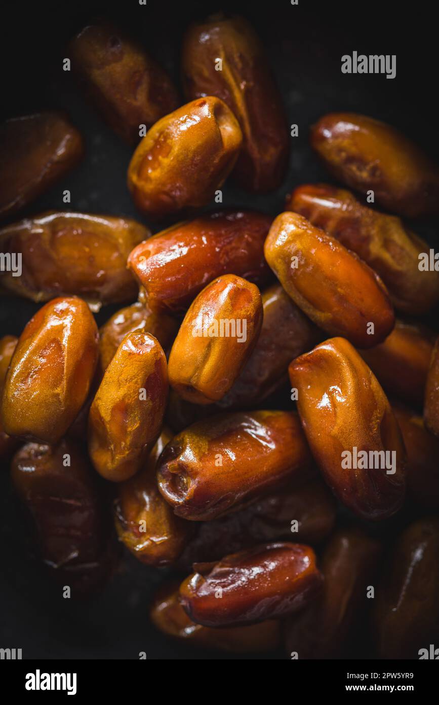 The dried dates fruit. Top view Stock Photo - Alamy