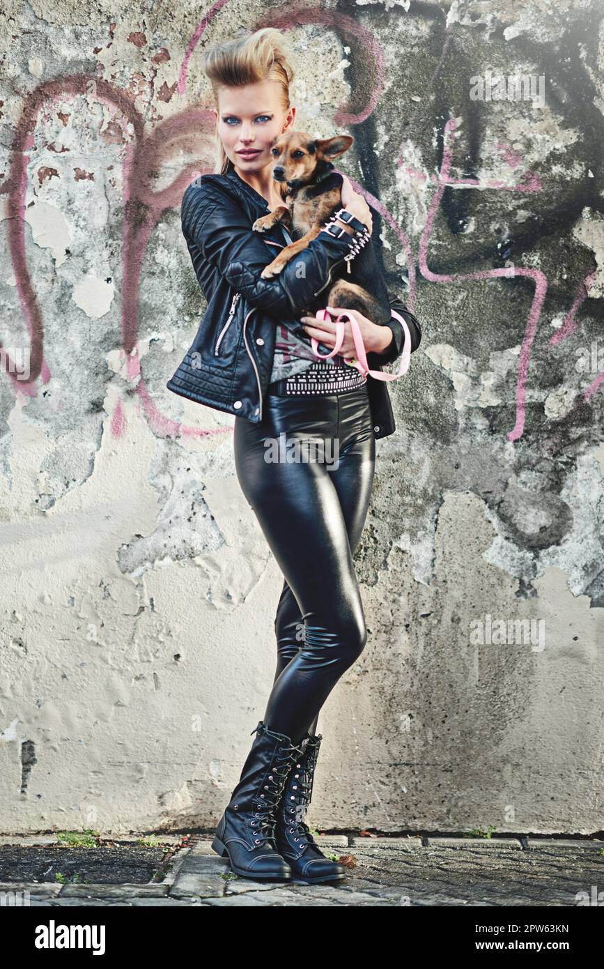 Hes a rockstars best friend. Full length portrait of an edgy young ...