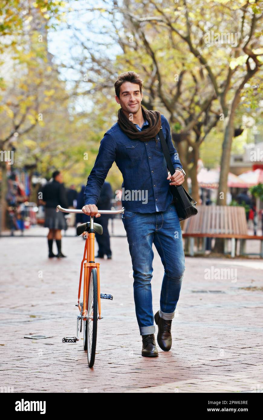 Getting around in style. Full length shot of a handsome man in the city ...