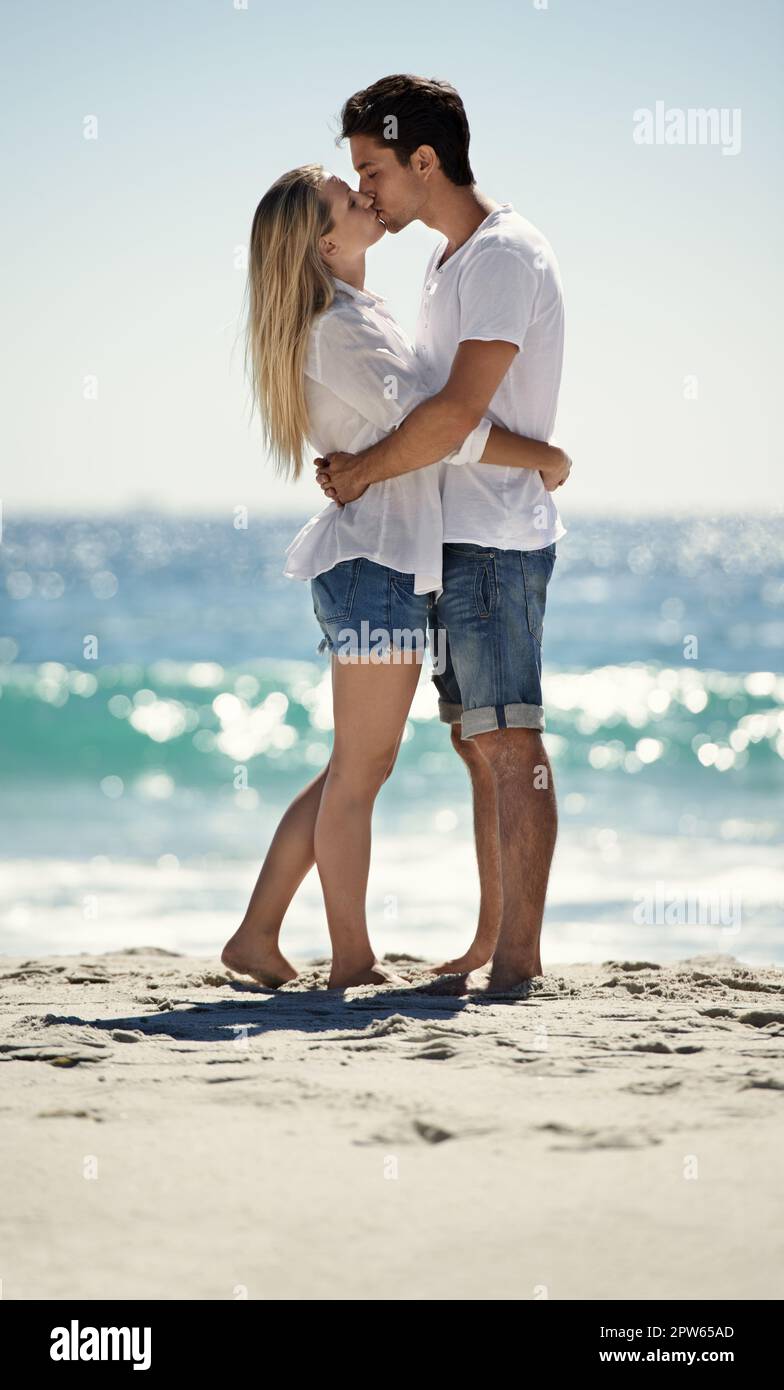 More Than Just A Summer Romance A Happy Young Couple Embracing On The