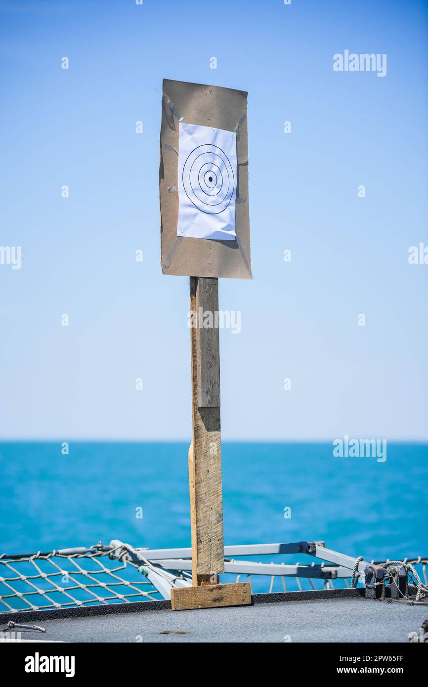 Color image of a paper shooting target on a pole Stock Photo - Alamy
