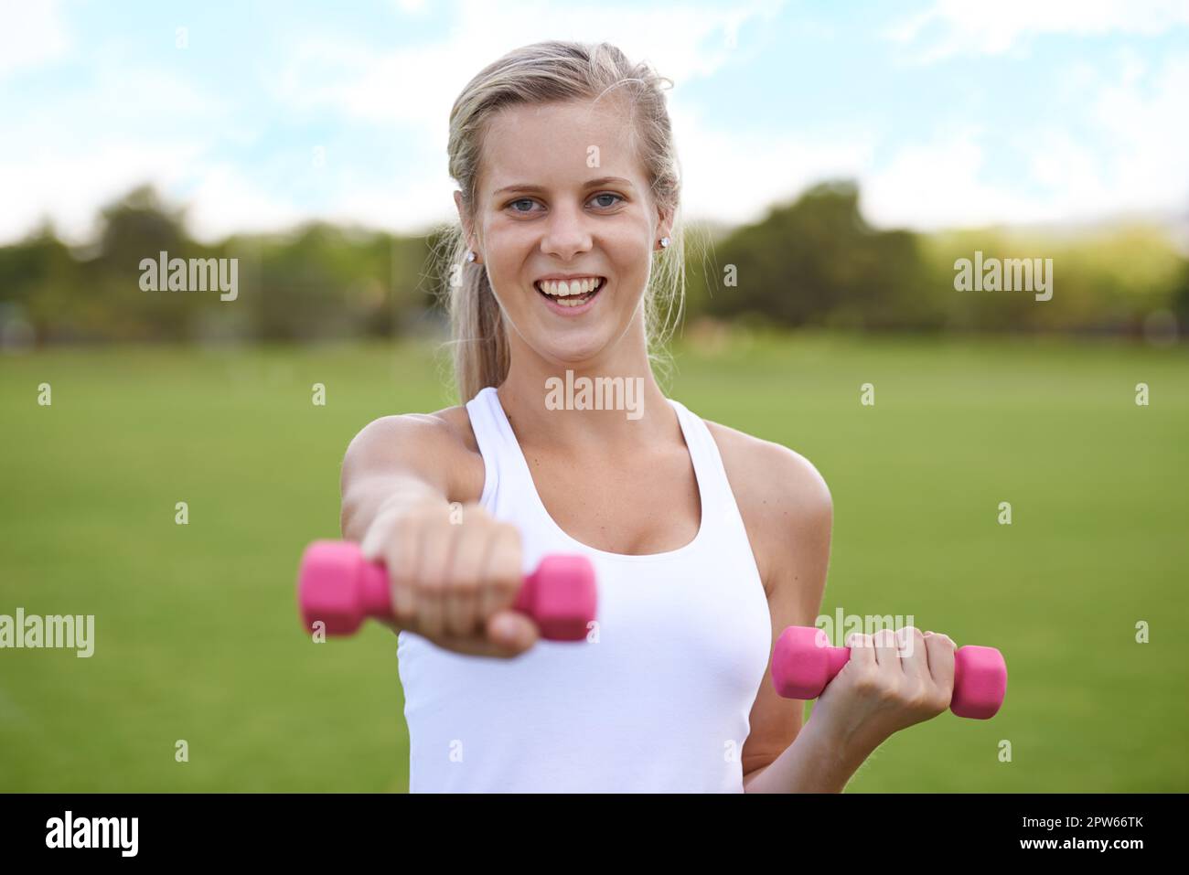 Sunshine and exercise. a group of young women exercising outdoors Stock ...