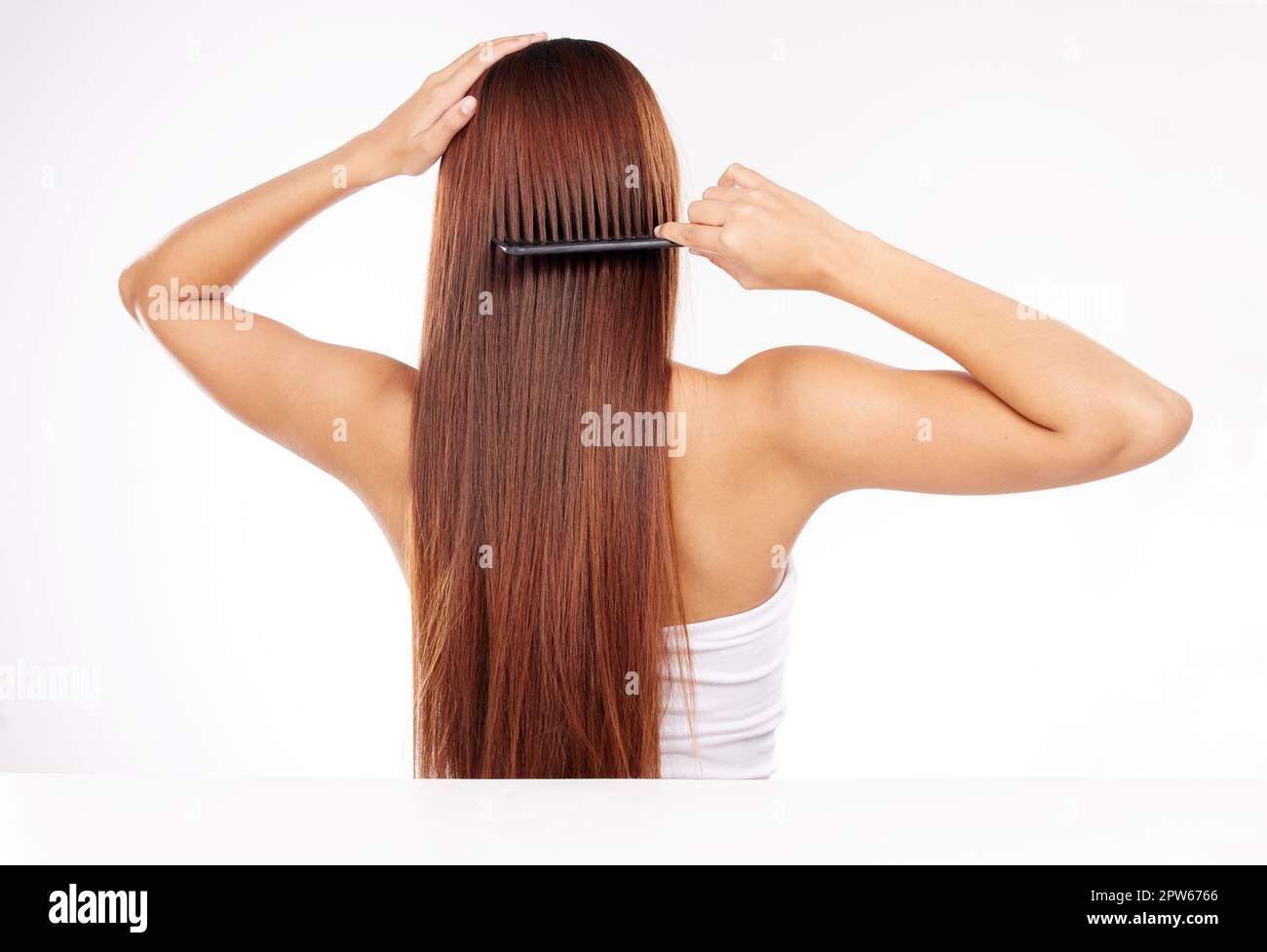 Hair care, brush and back of woman with comb for haircare maintenance ...