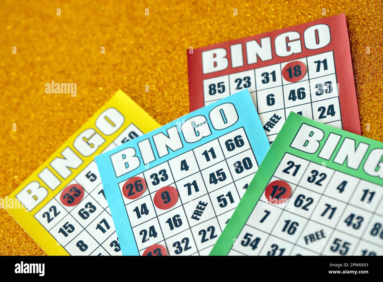 Many colorful bingo boards or playing cards for winning chips. Classic ...