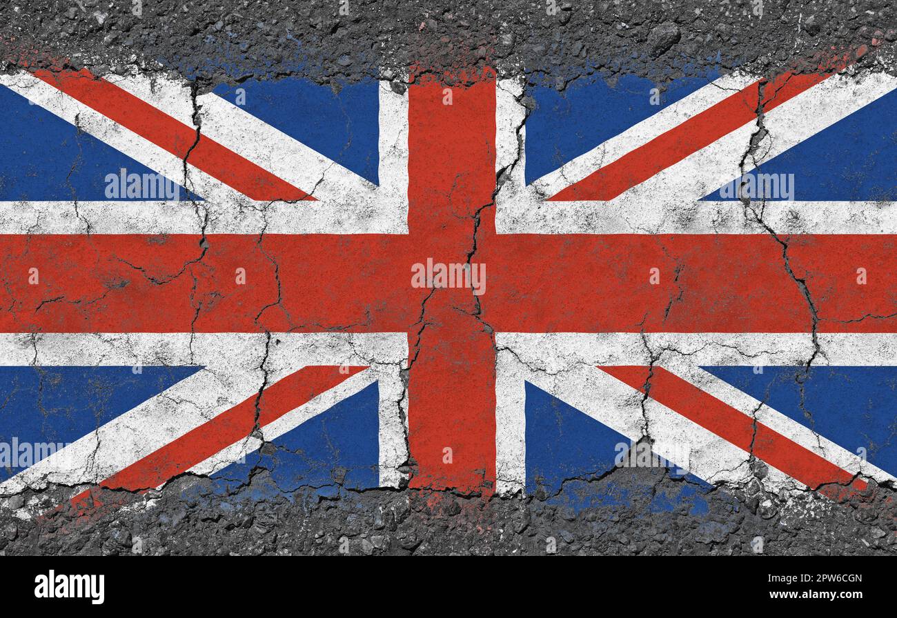 Grunge damaged weathered national flag of UK Great Britain over broken ...