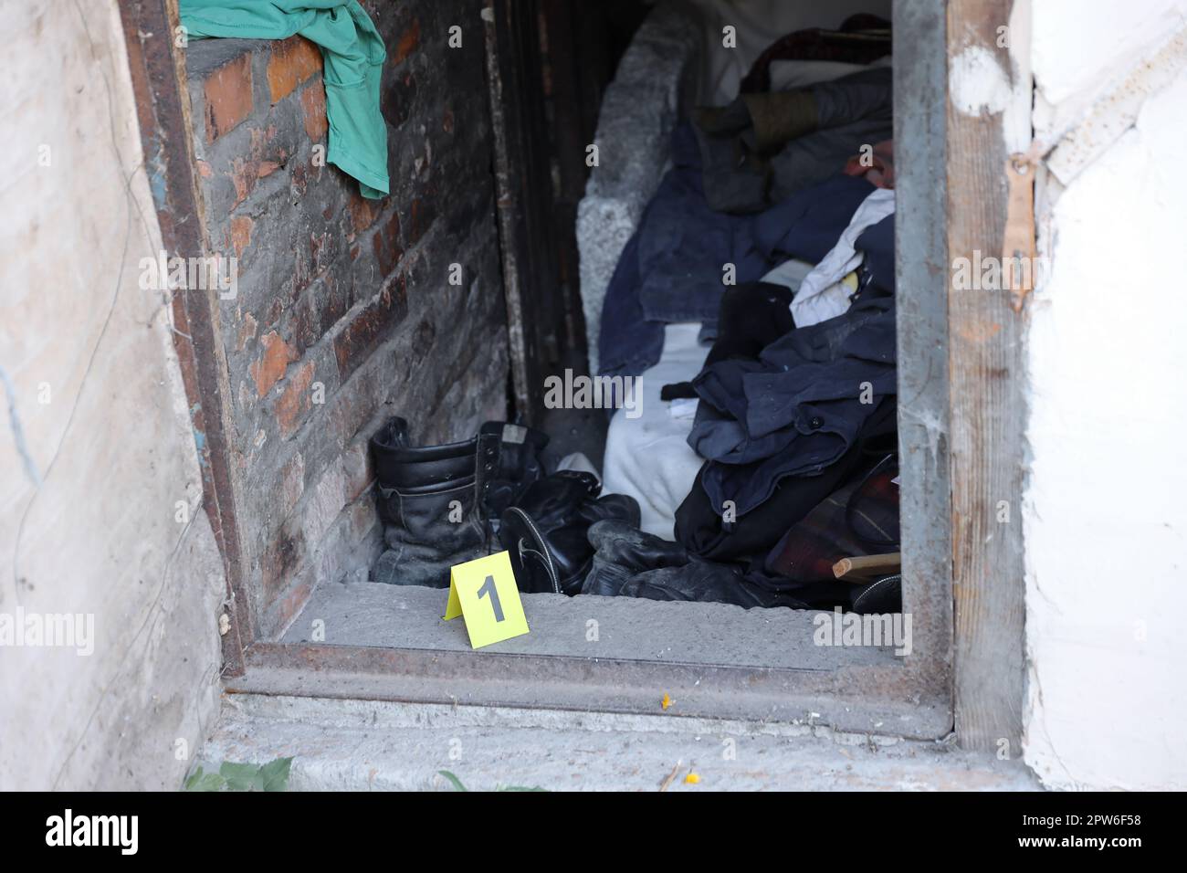 Evidence with yellow CSI marker for evidence numbering on the ...