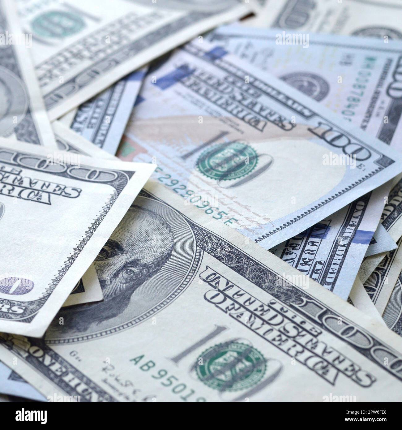 Background of 100 dollar bills. Abstract textured backdrop with many ...