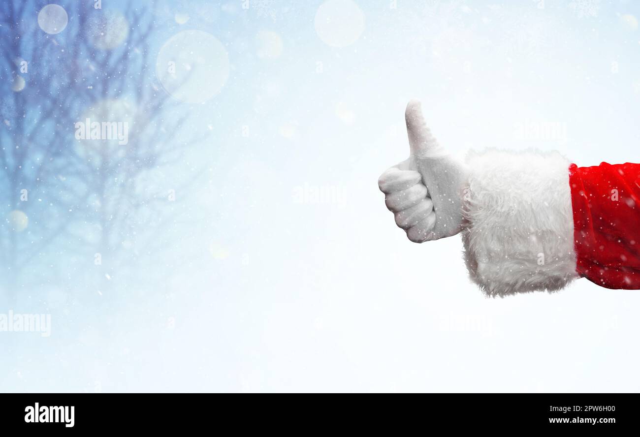 Cheerful santa giving thumb up hi-res stock photography and images - Alamy