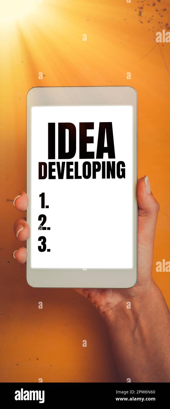 Hand writing sign Idea Developing, Internet Concept innovating the ...