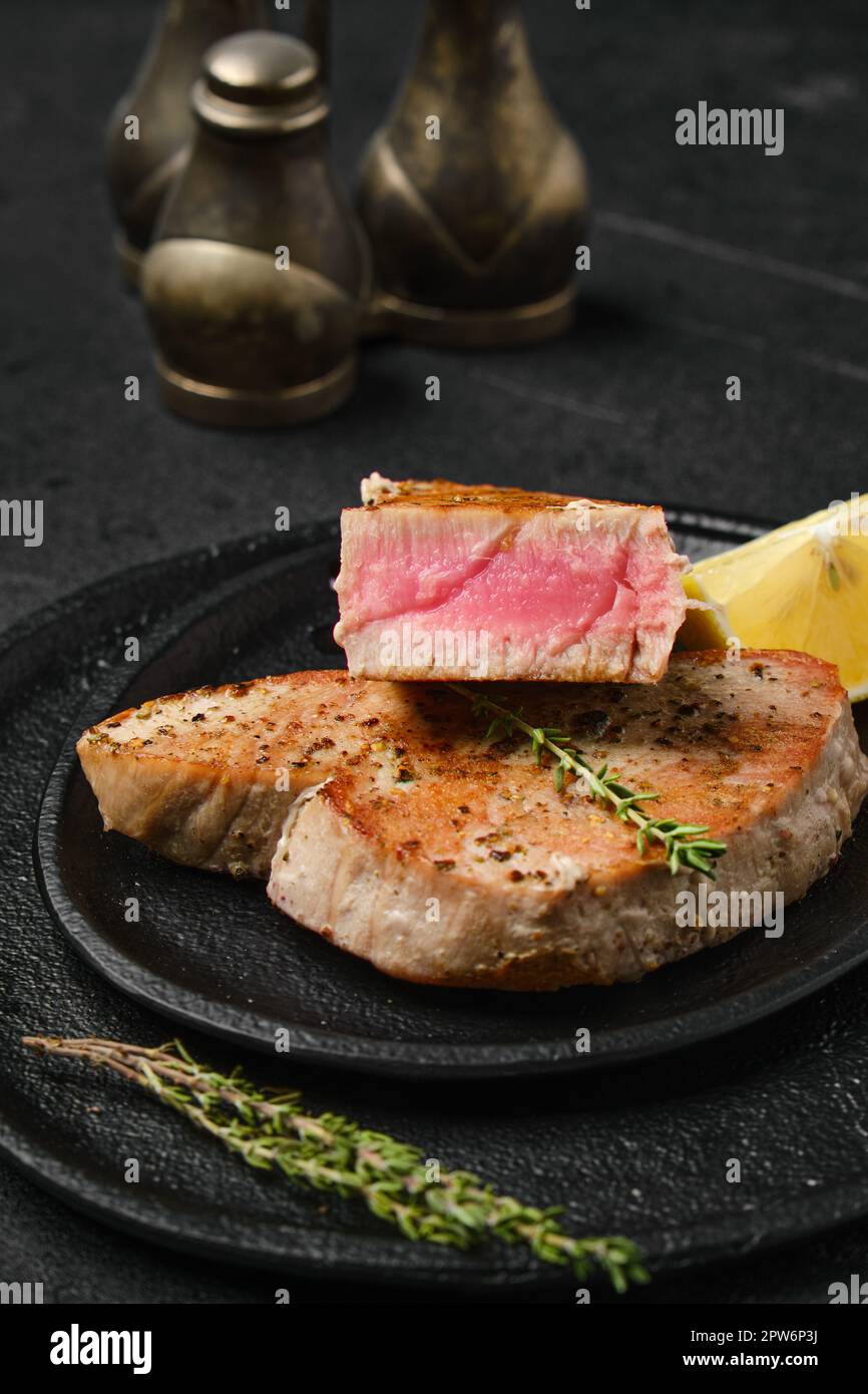 Closeup view of fried tuna steak Stock Photo - Alamy